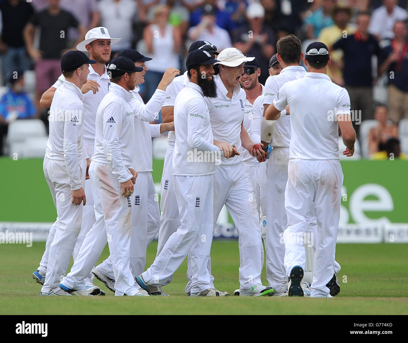 England's Ben Stokes (floppy hat) celebrates after taking the catch of ...