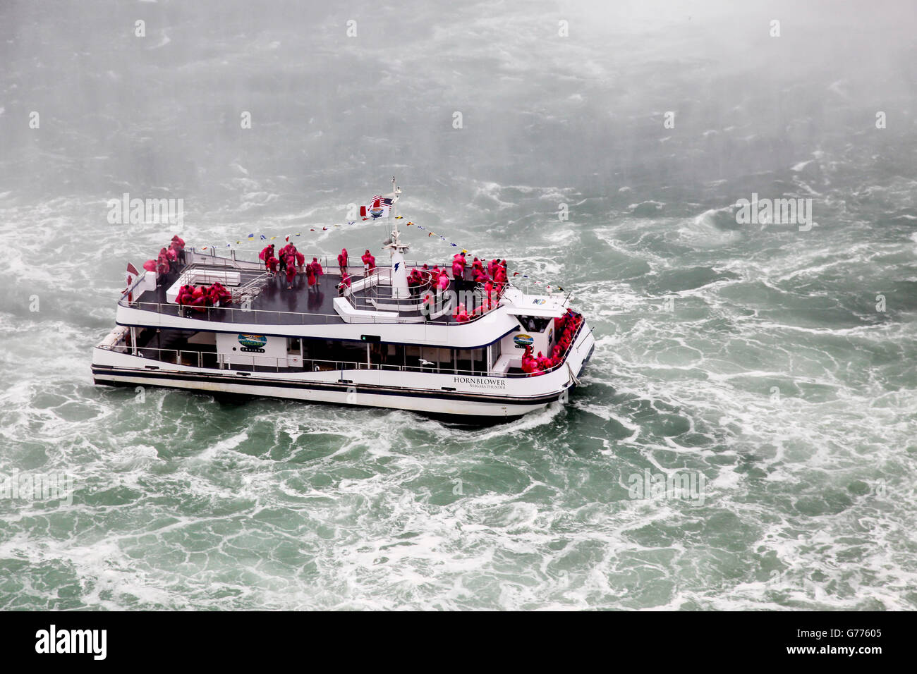 Hornblower Niagara Thunder boat with tourists in Niagara Falls view ...