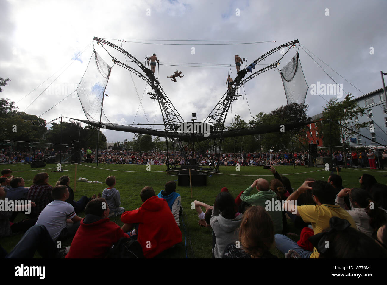 Crowds watch the outdoor acrobatic theater show, HALLALI part of Galway ...