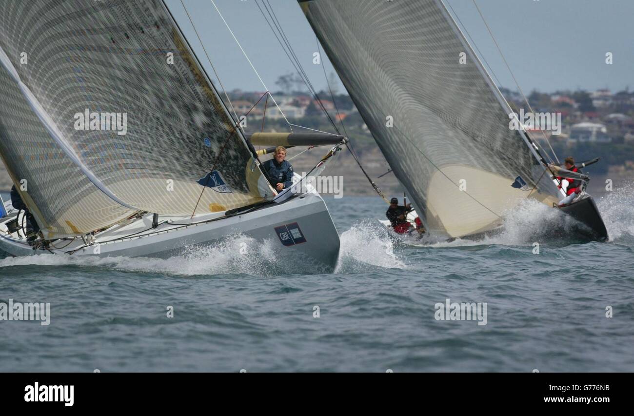 Britain's America's Cup yacht Wight Lightning (left) prepares to round ...