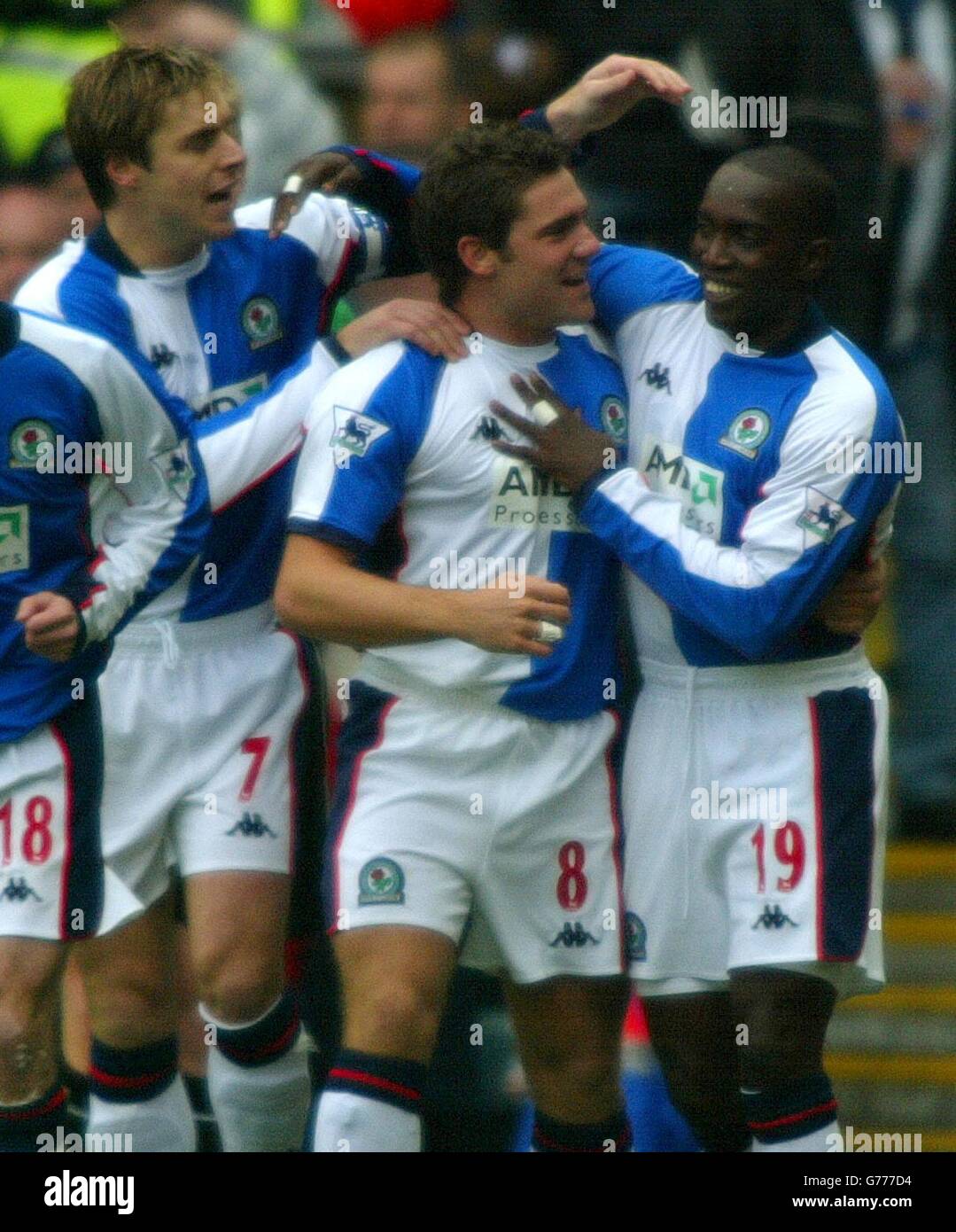 Blackburn's David Dunn (C) celebrates his 1st goal with Garry Flitcroft ...