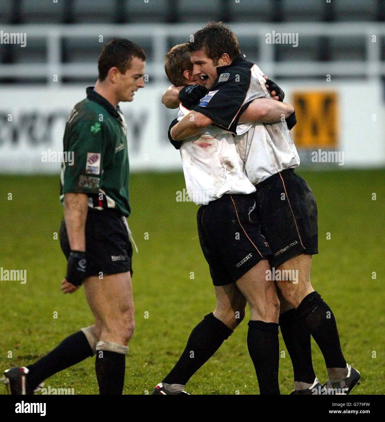 Newcastle's Tom May (right) celebrates his try against London Irish ...