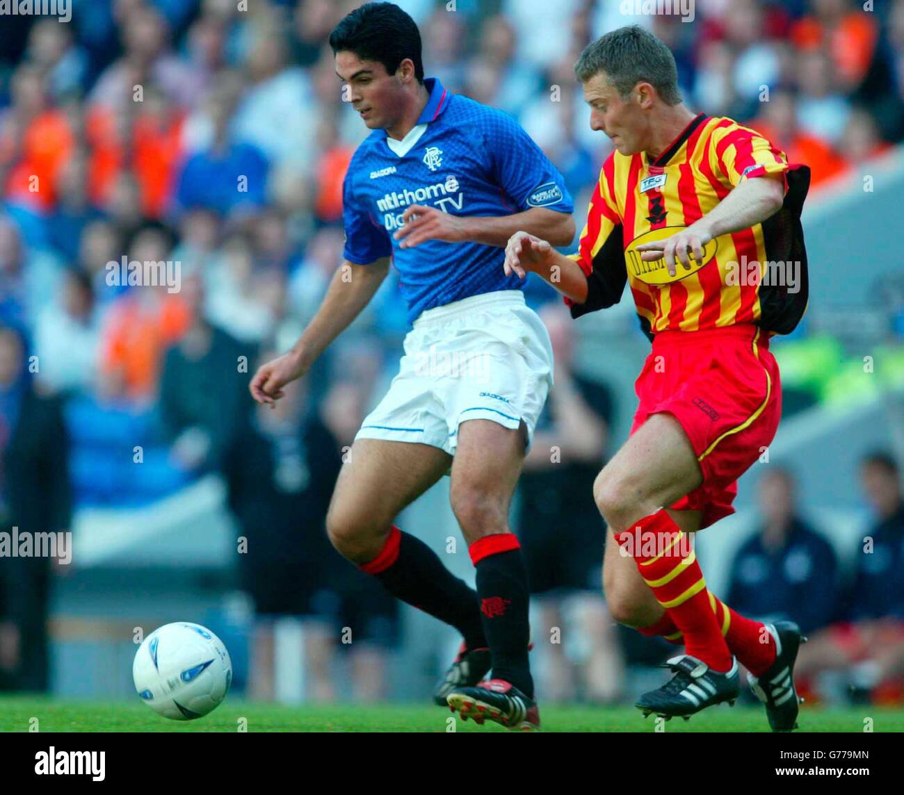 Rangers' Mikel Arteta (L) and Partick Thistle's Stephen Craigen battle ...