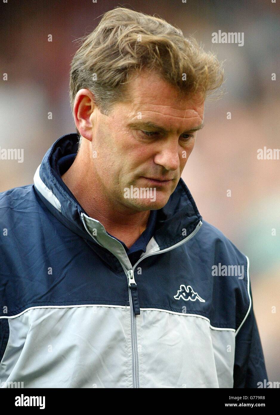 Tottenham Hotspur manager Glenn Hoddle leaves the pitch after his team ...
