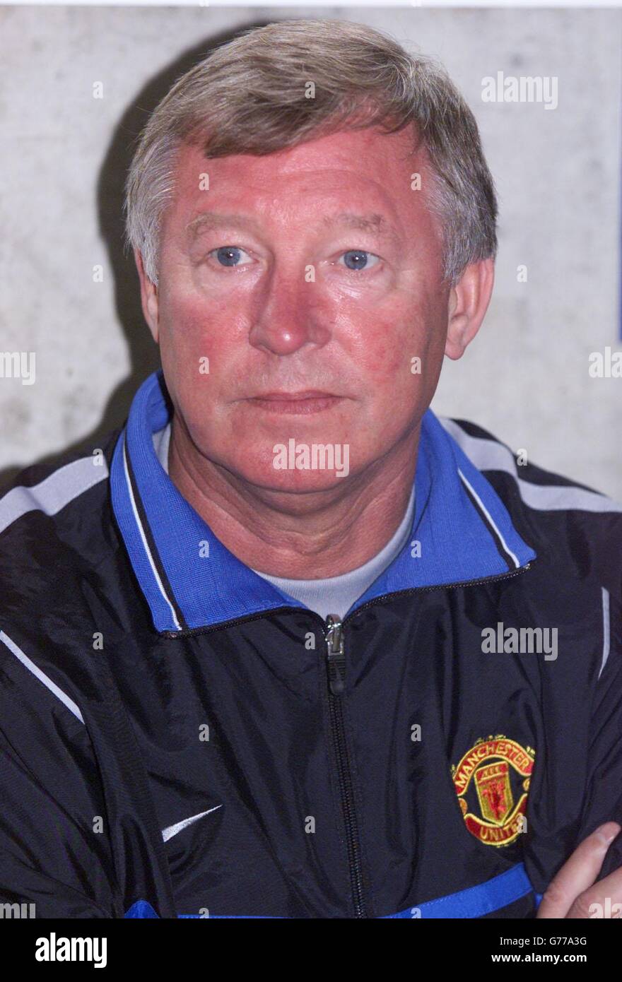 Manchester United's manager Sir Alex Ferguson takes his place on the ...