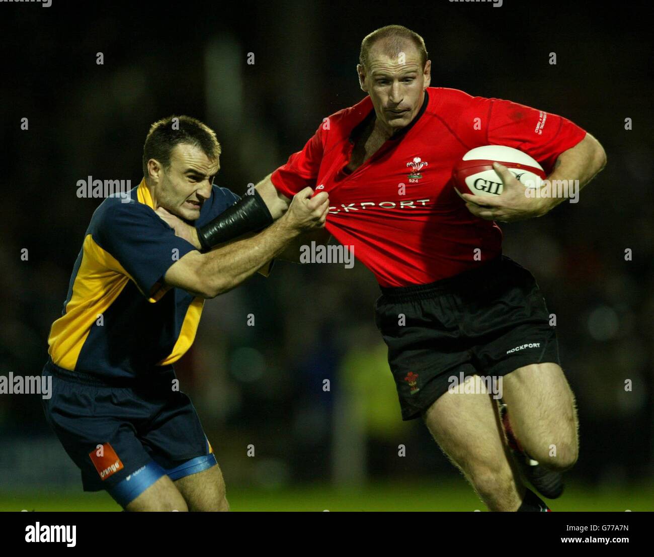 Action tackle hand off hi-res stock photography and images - Alamy