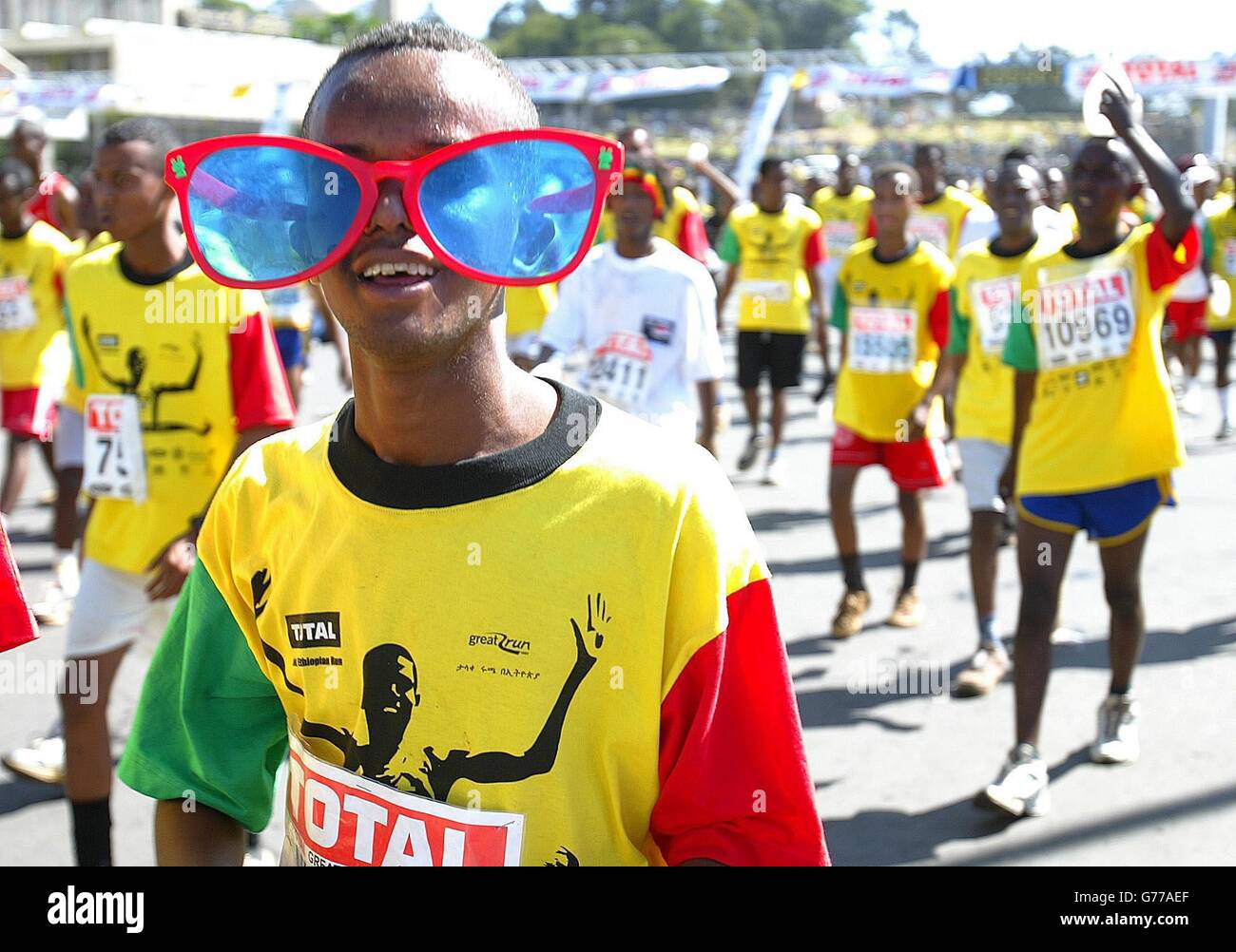 Ethiopian runners cross the finish line of the Great Ethiopian Run 2002 ...
