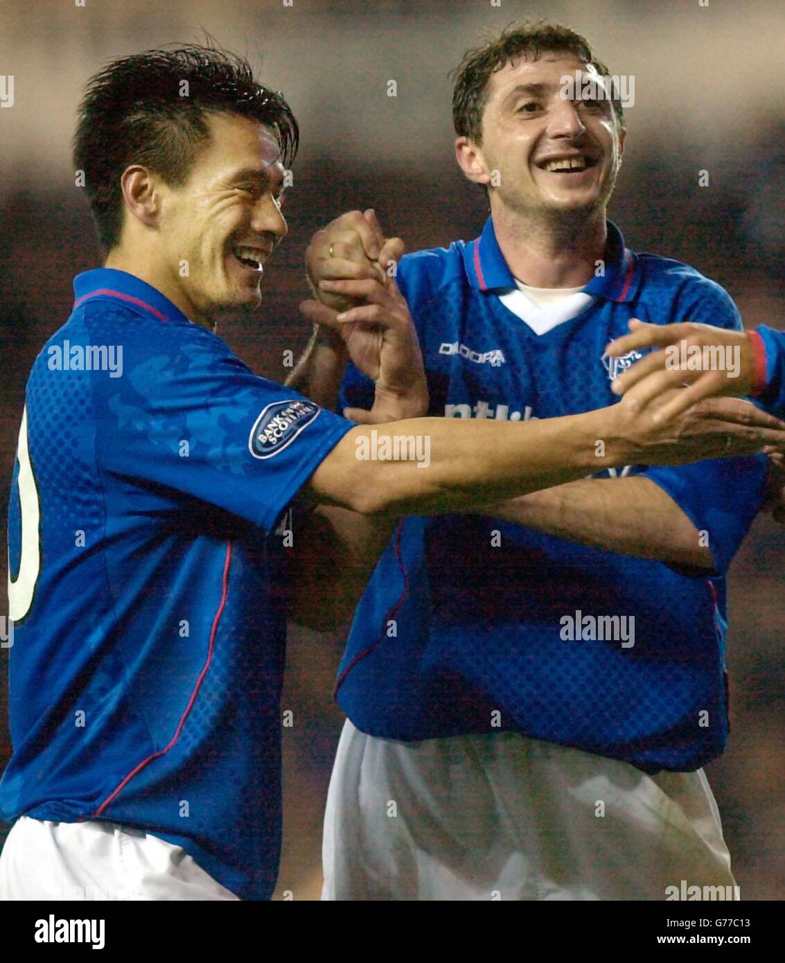 Rangers' Shota Arveladze (right) celebrates his goal against ...