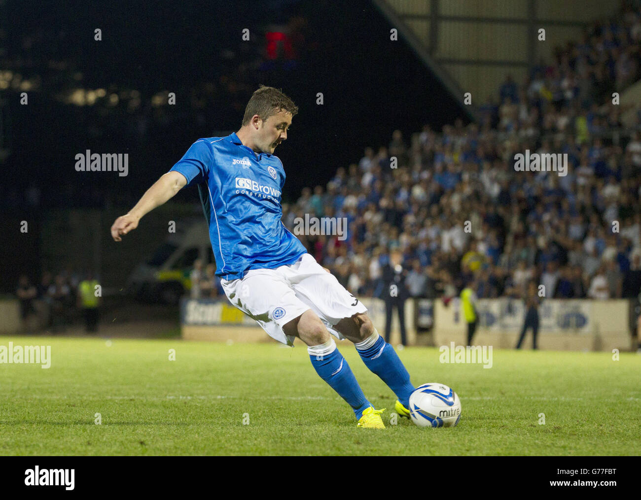 St Johnstone's Tam Scobbie scores the winning penalty during the shoot ...