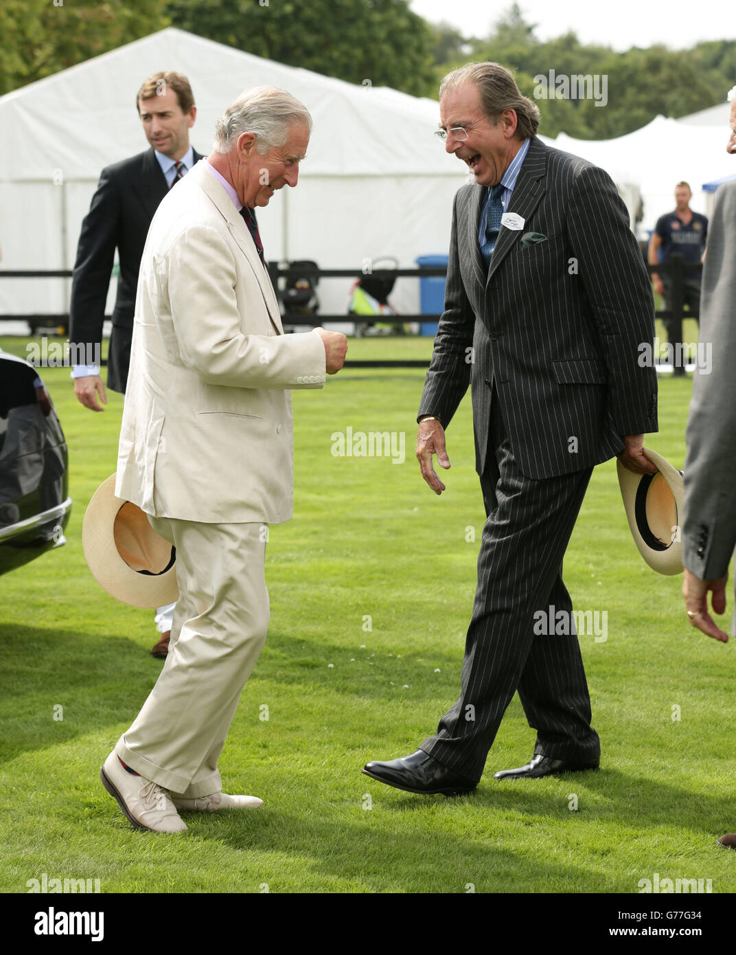The Prince of Wales (left) greets Brigadier John Wright, Chairman of ...