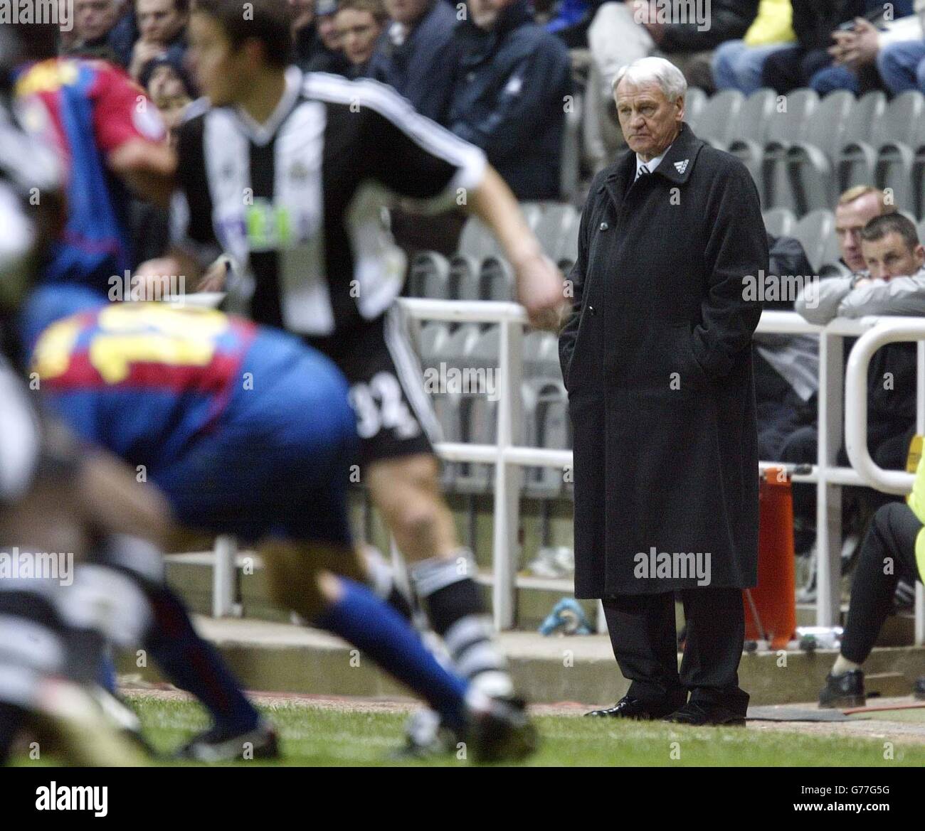 Newcastle United Manager Sir Bobby Robson watches his side going behind ...
