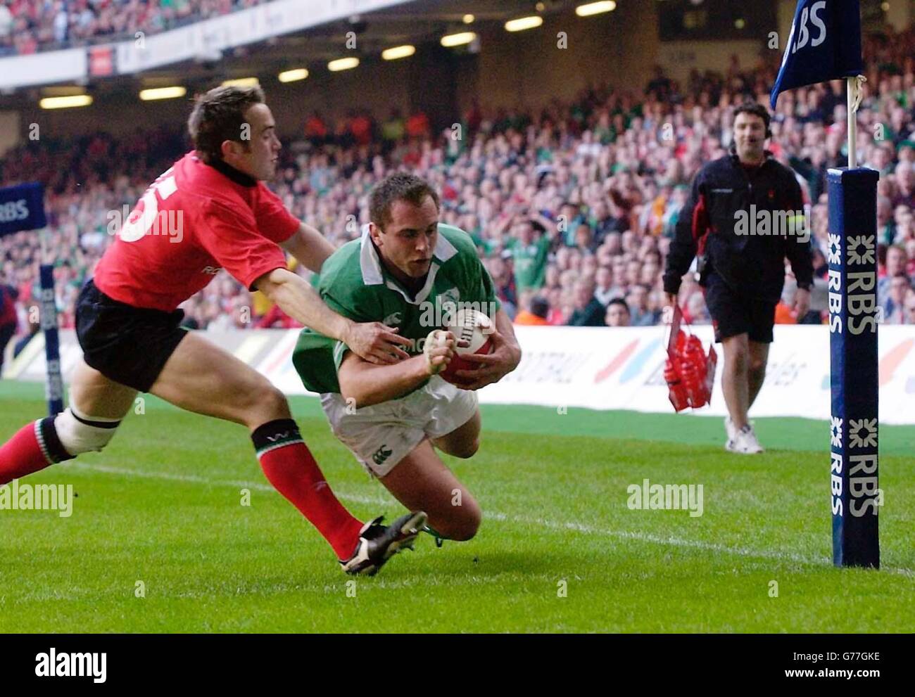 Wales' Rhys Williams (left) fails to stop Ireland's Keith Gleeson from ...