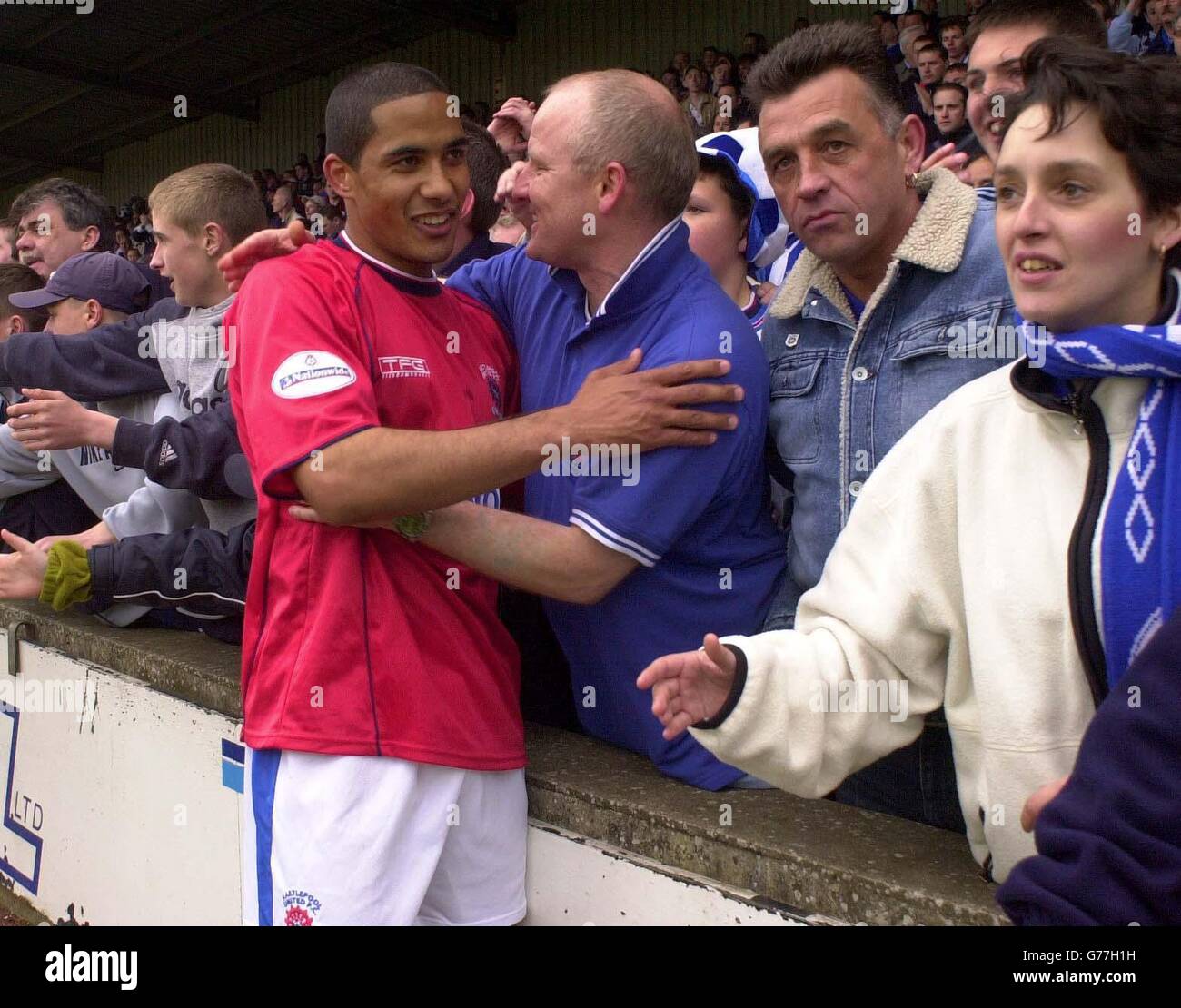 John jones celebrating smiling hi-res stock photography and images - Alamy