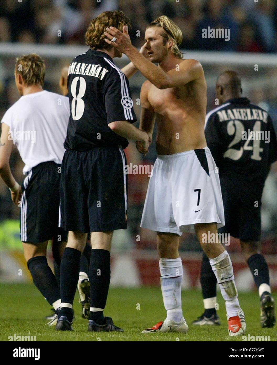 Manchester United's David Beckham is consoled by Steve McManaman of ...