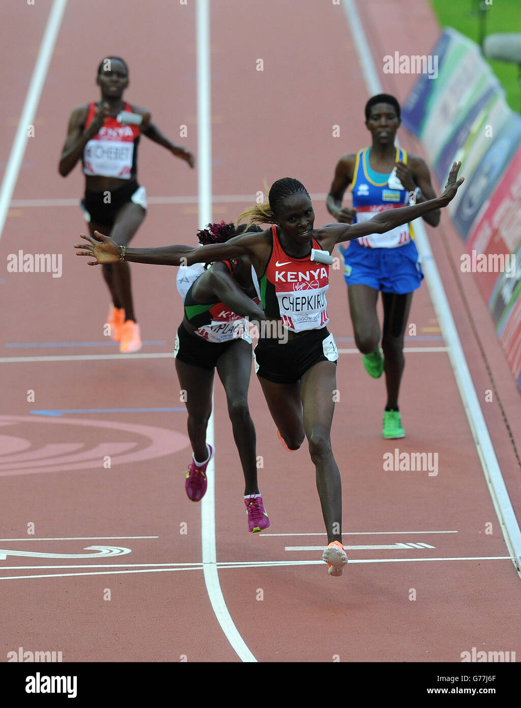 Kenya's Joyce Chepkirui (centre right) goes on to win ahead of Kenya's ...