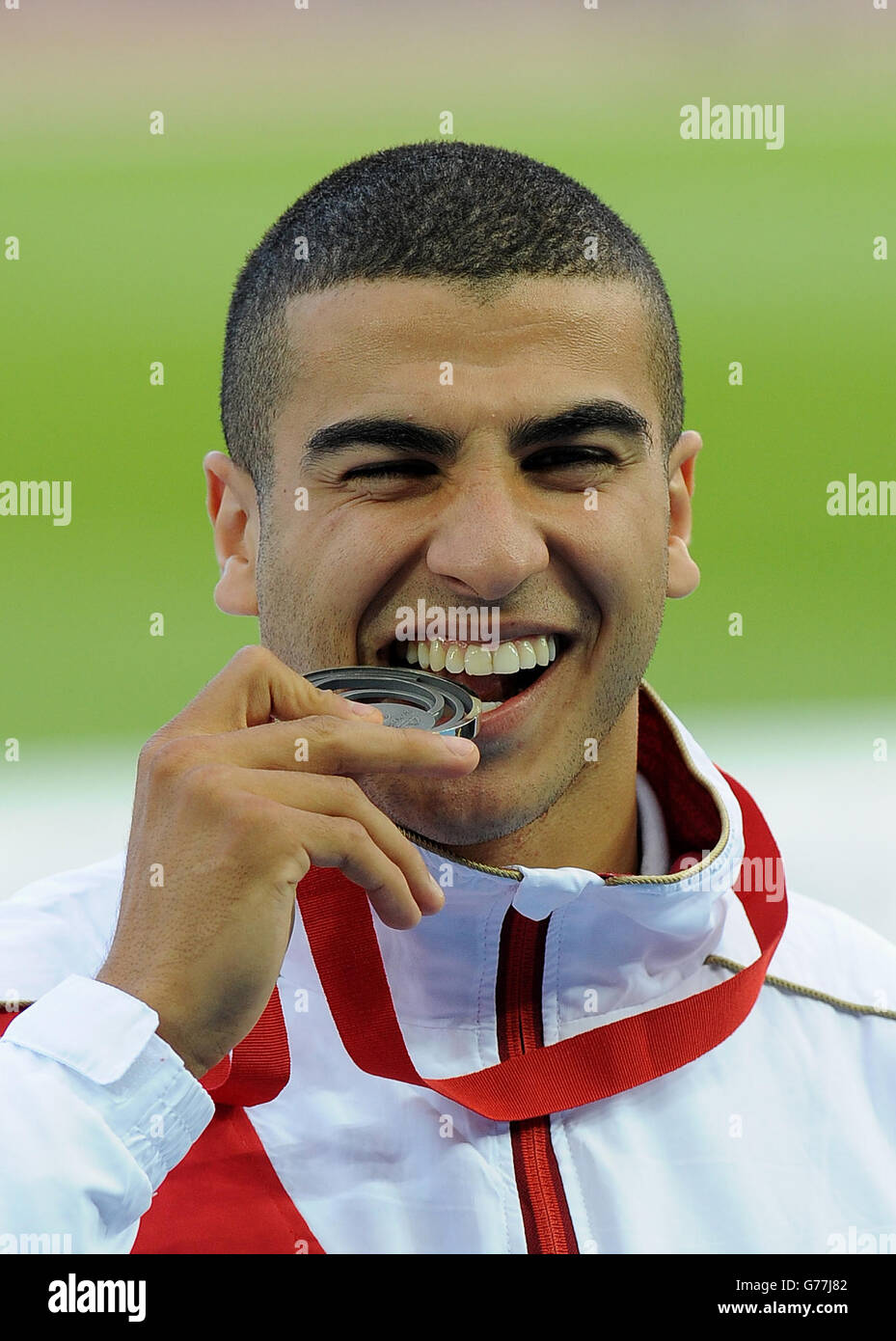 England's Adam Gemili celebrates with his silver medal after finishing ...