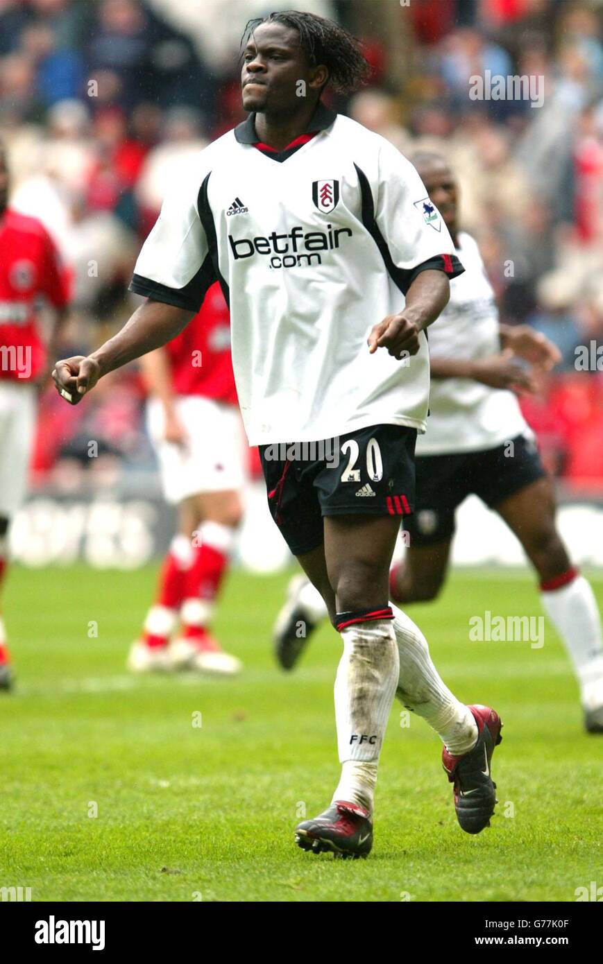 Fulham's Louis Saha celebrates after scoring from the penalty spot ...