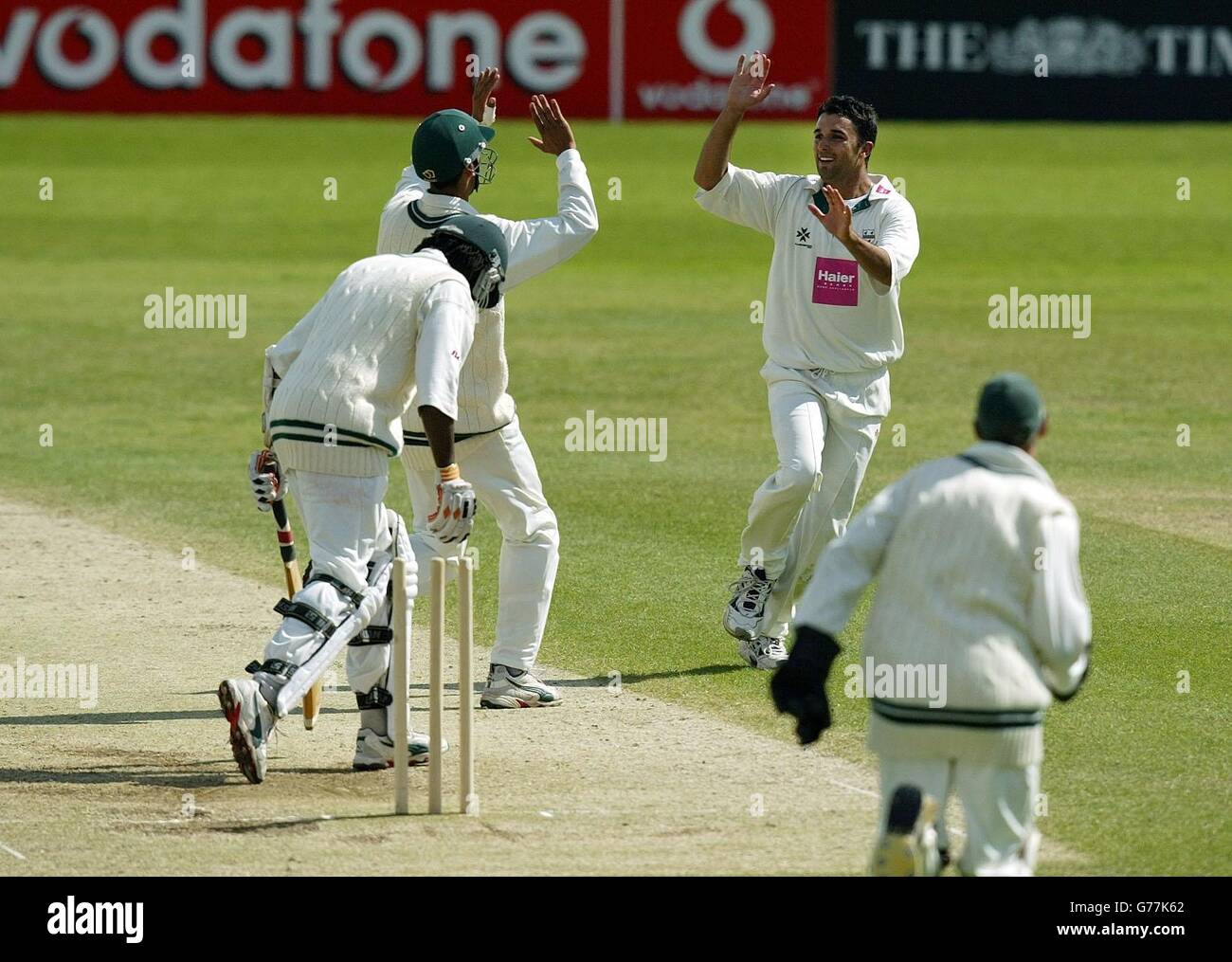 Worcestershire bowler Kabir Ali (2nd right) celebrates with Kadeer Ali ...
