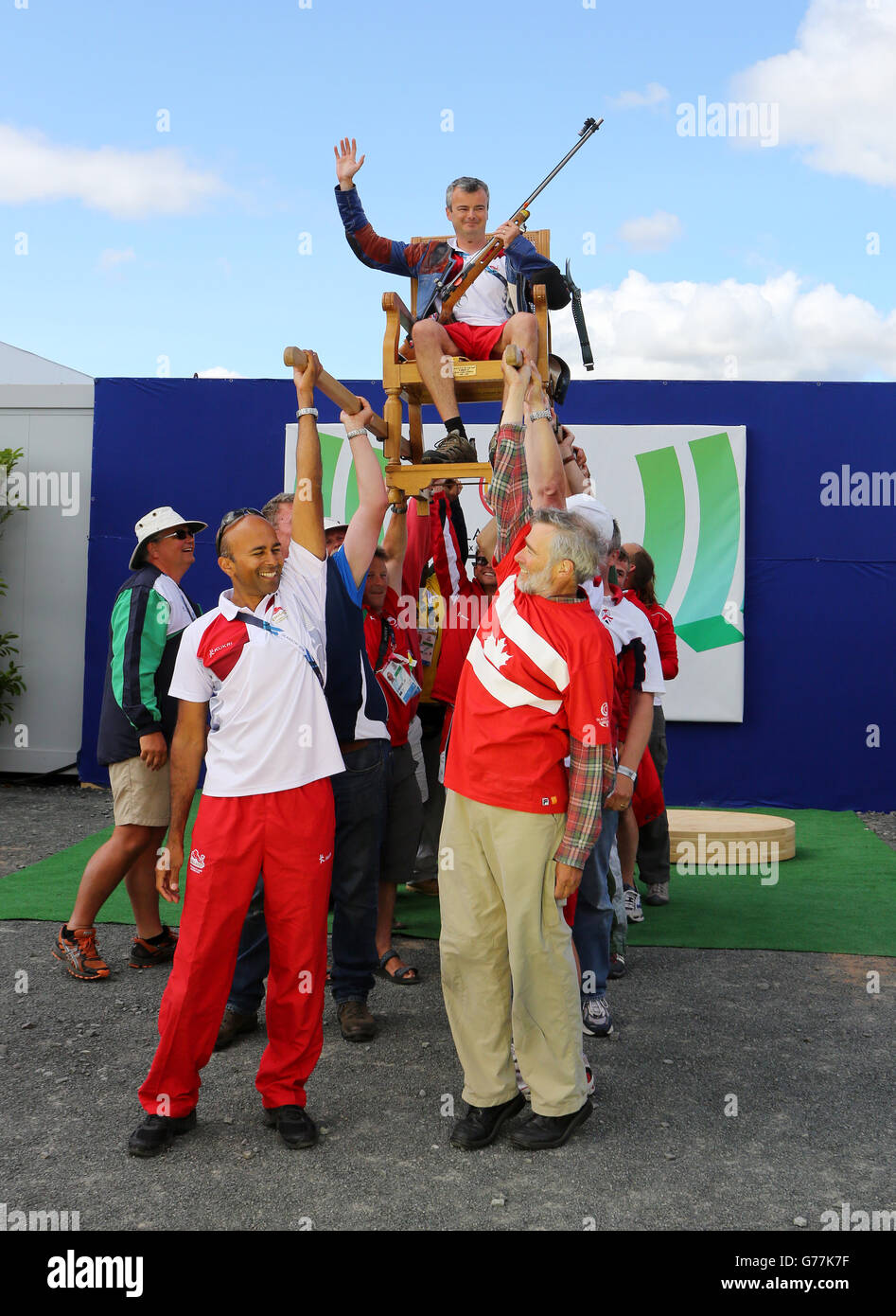 England's David Luckman is carried away from the shooting range by his ...