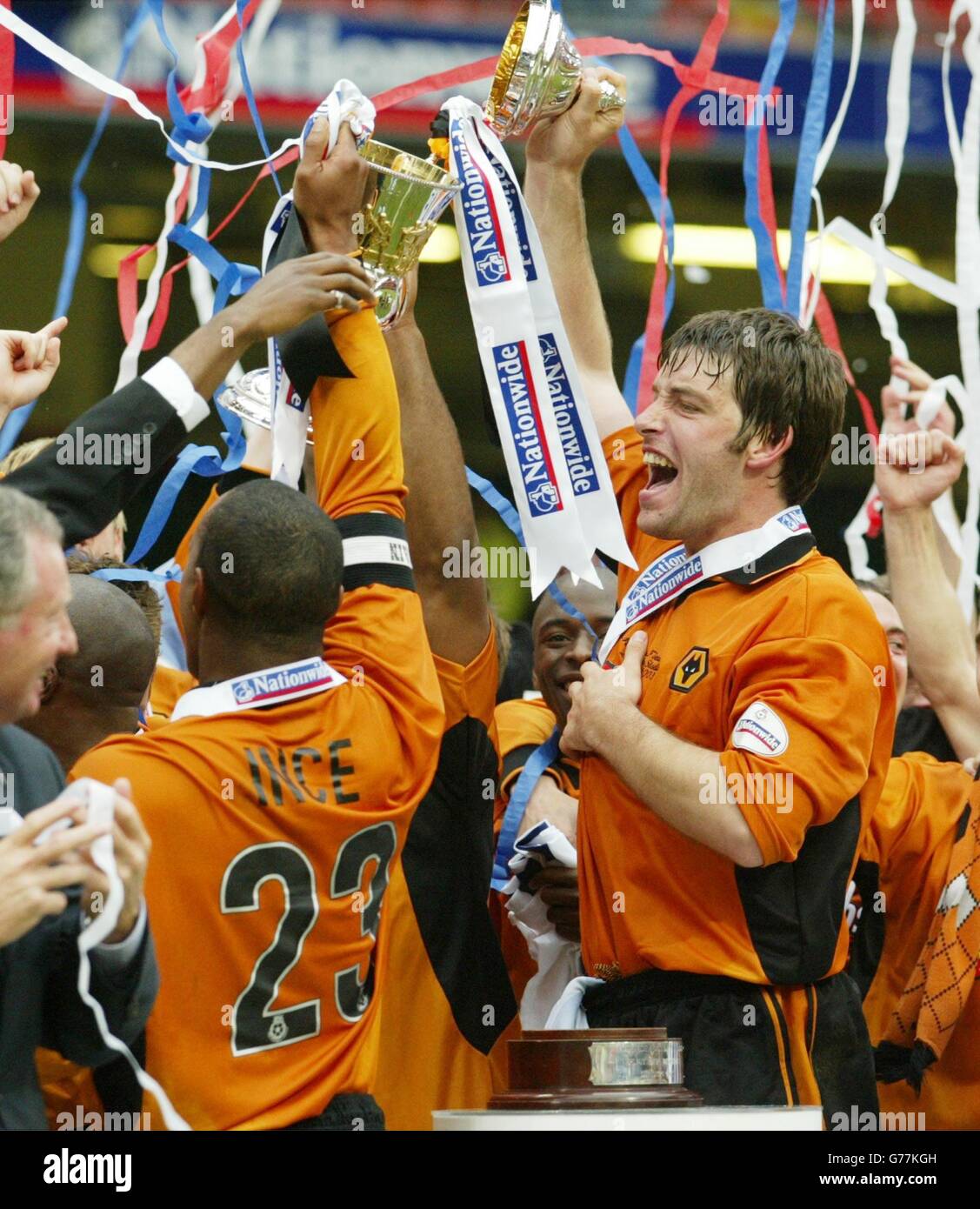 Wolves' Paul Ince (left) and Paul Butler (right) lift the trophy in ...