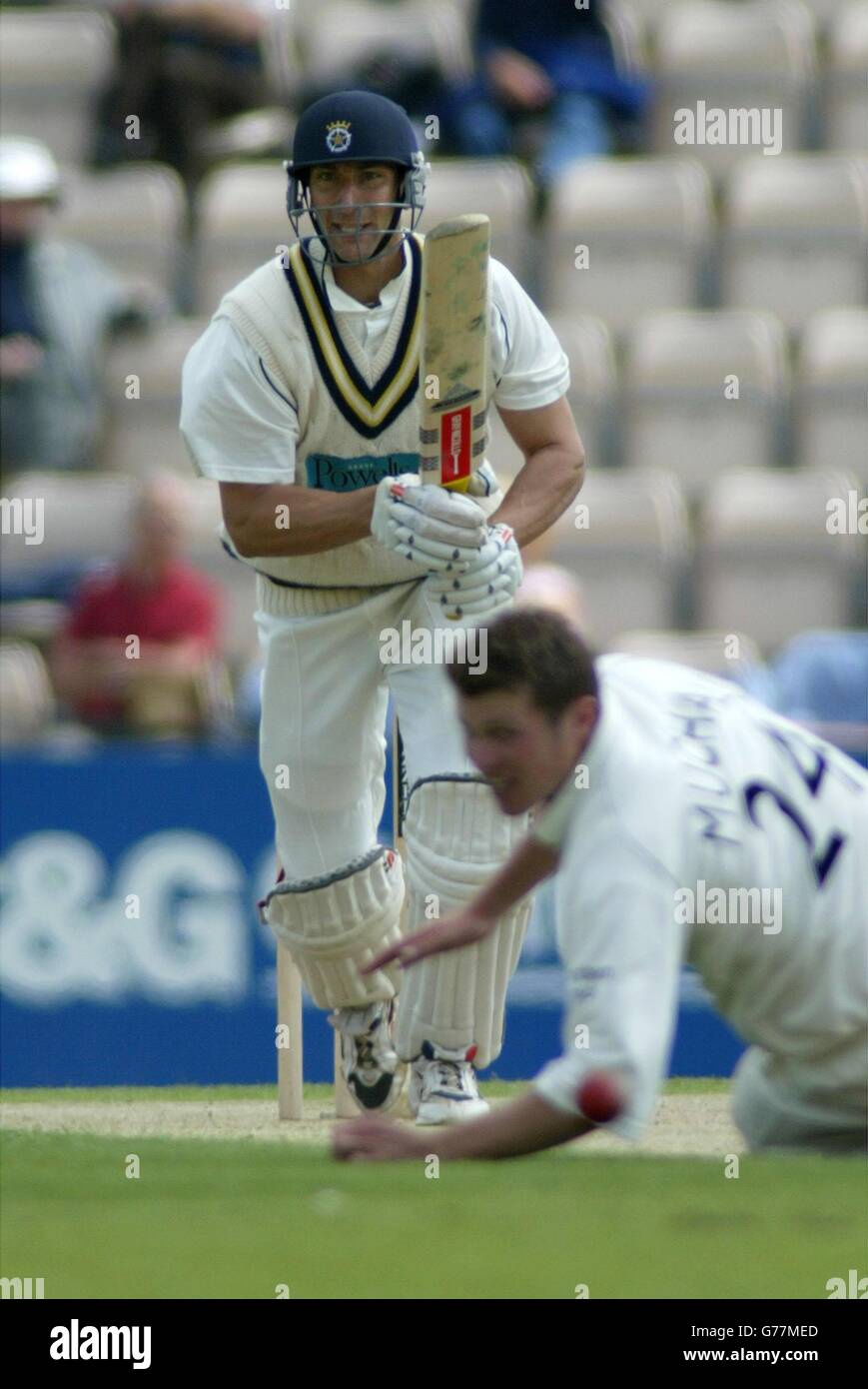 Nic Pothas drives a boundary for Hampshire under the diving Durham ...