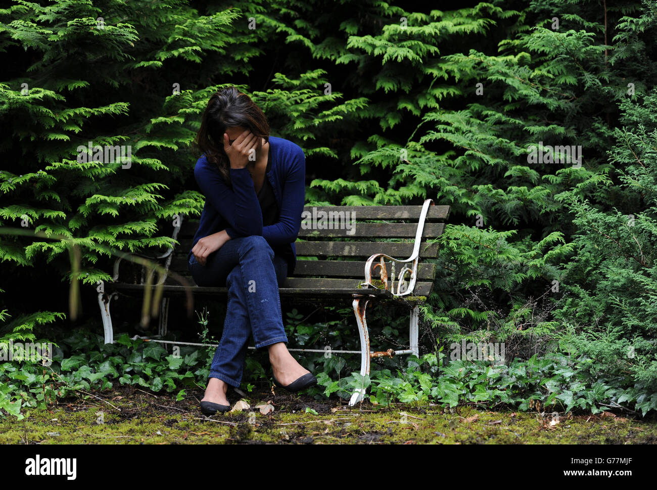 Picture posed by model a woman showing signs of depression hi-res stock ...