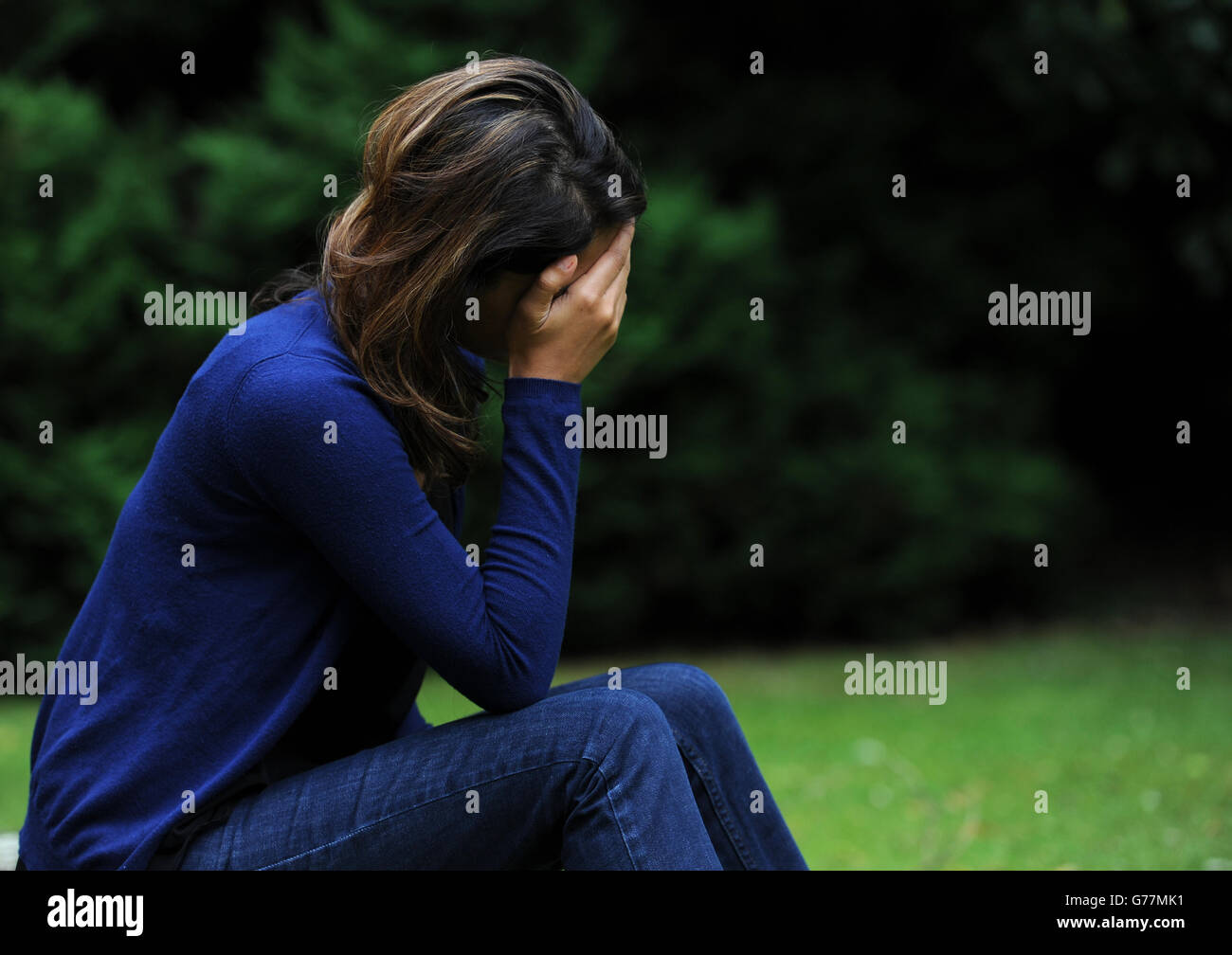 PICTURE POSED BY MODEL. A woman showing signs of depression Stock Photo ...