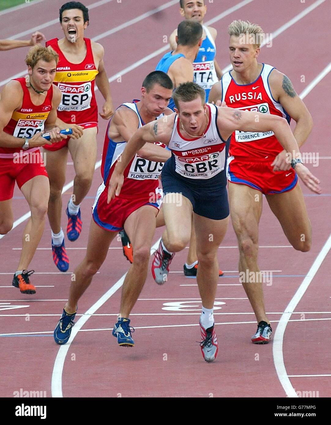 Blocking tactics as Tim Benjamin of the Great Britain 4x400 Relay squad ...