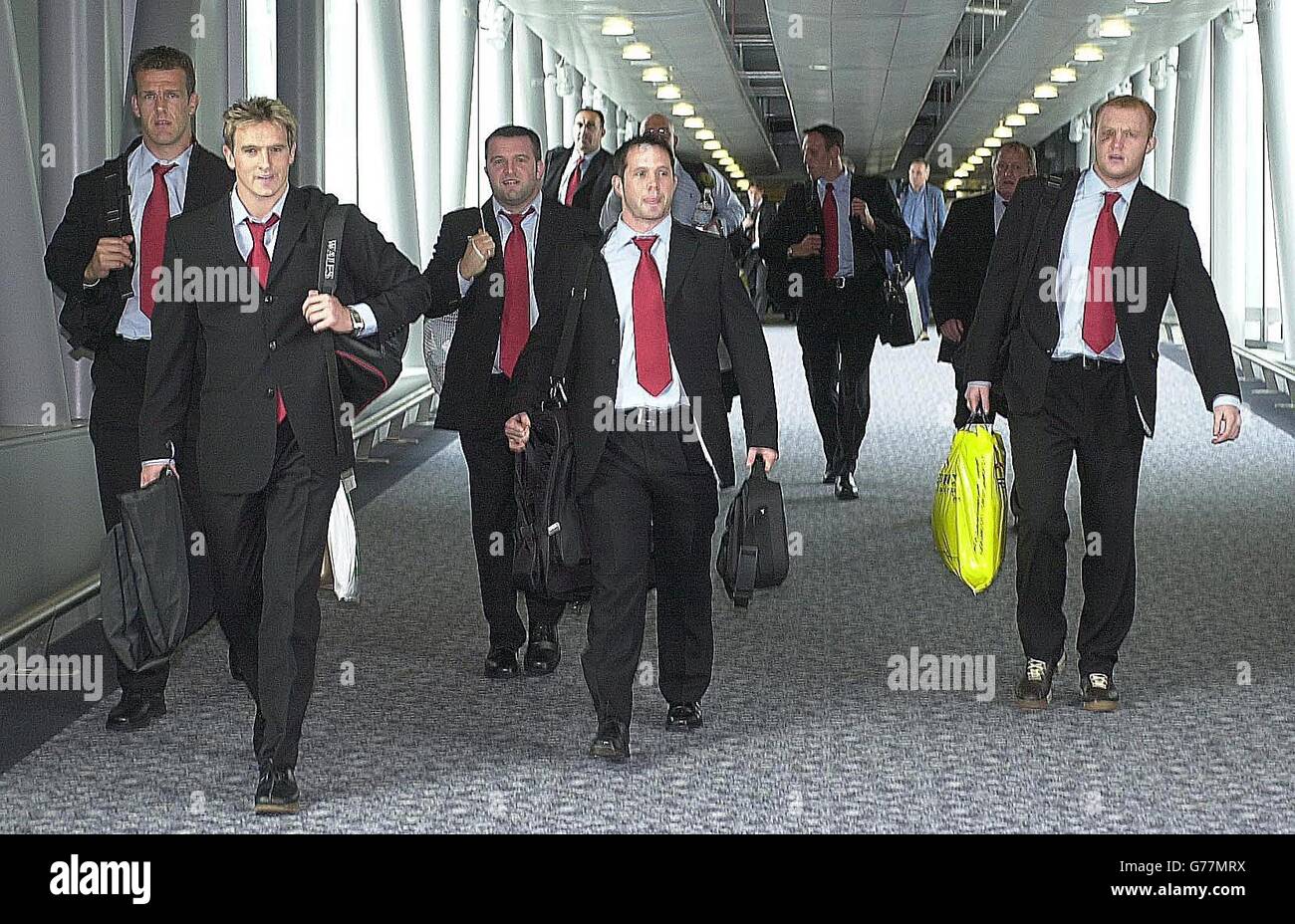 Welsh rugby team at Heathrow Airport Stock Photo - Alamy