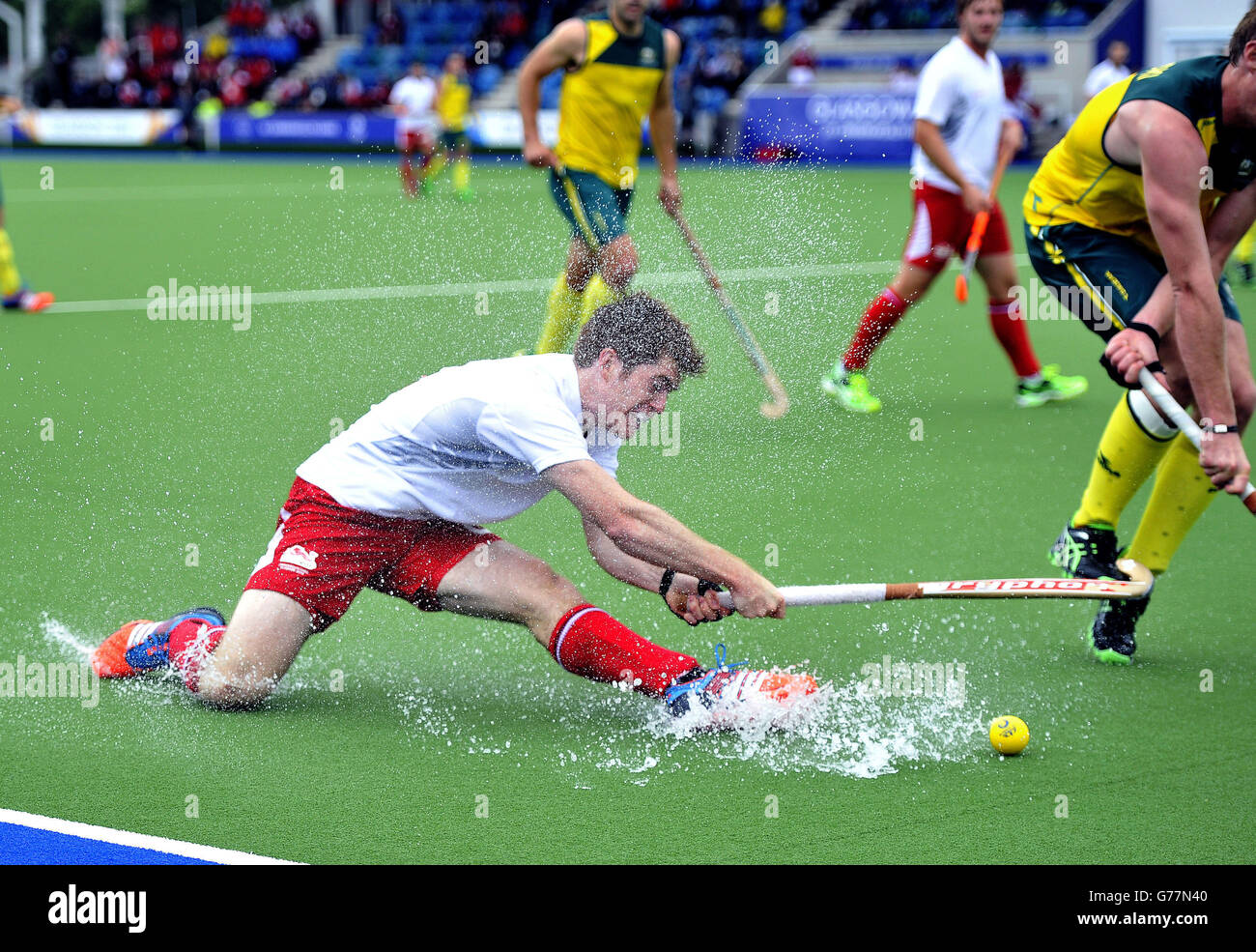 England's Henry Weir slides in the rain as Australia defeat England at ...