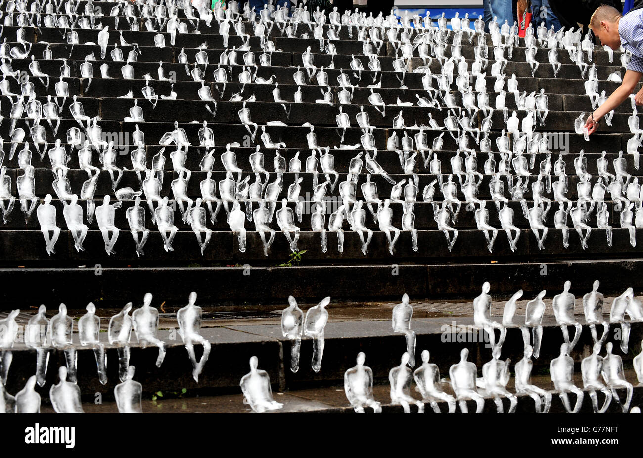 Some of the 5,000 figures made out of ice form the Minimum Monument, a ...