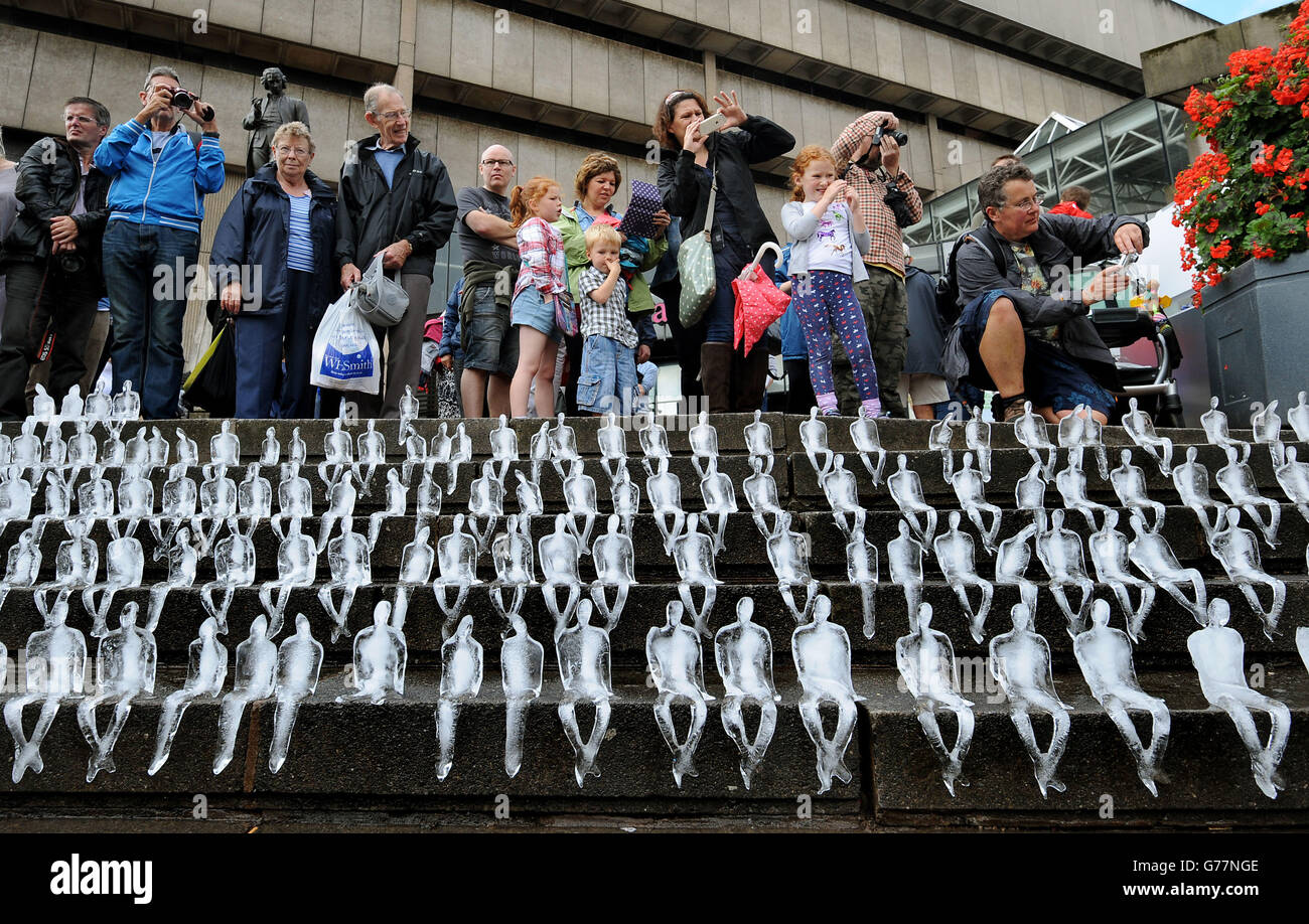Some of the 5,000 figures made out of ice form the Minimum Monument, a ...