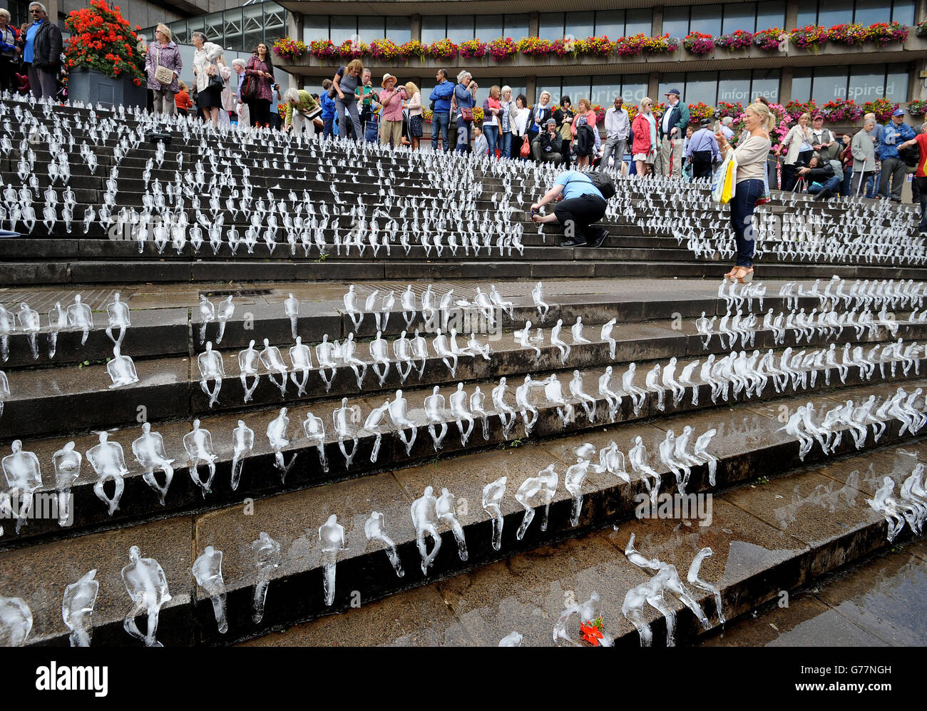 Some of the 5,000 figures made out of ice form the Minimum Monument, a ...
