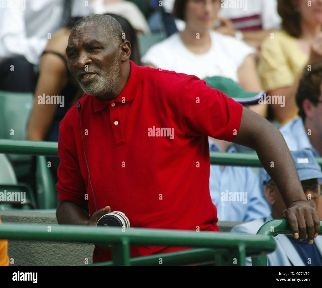 , NOT FOR USE ON MOBILE PHONES Richard Williams watches his daughter ...