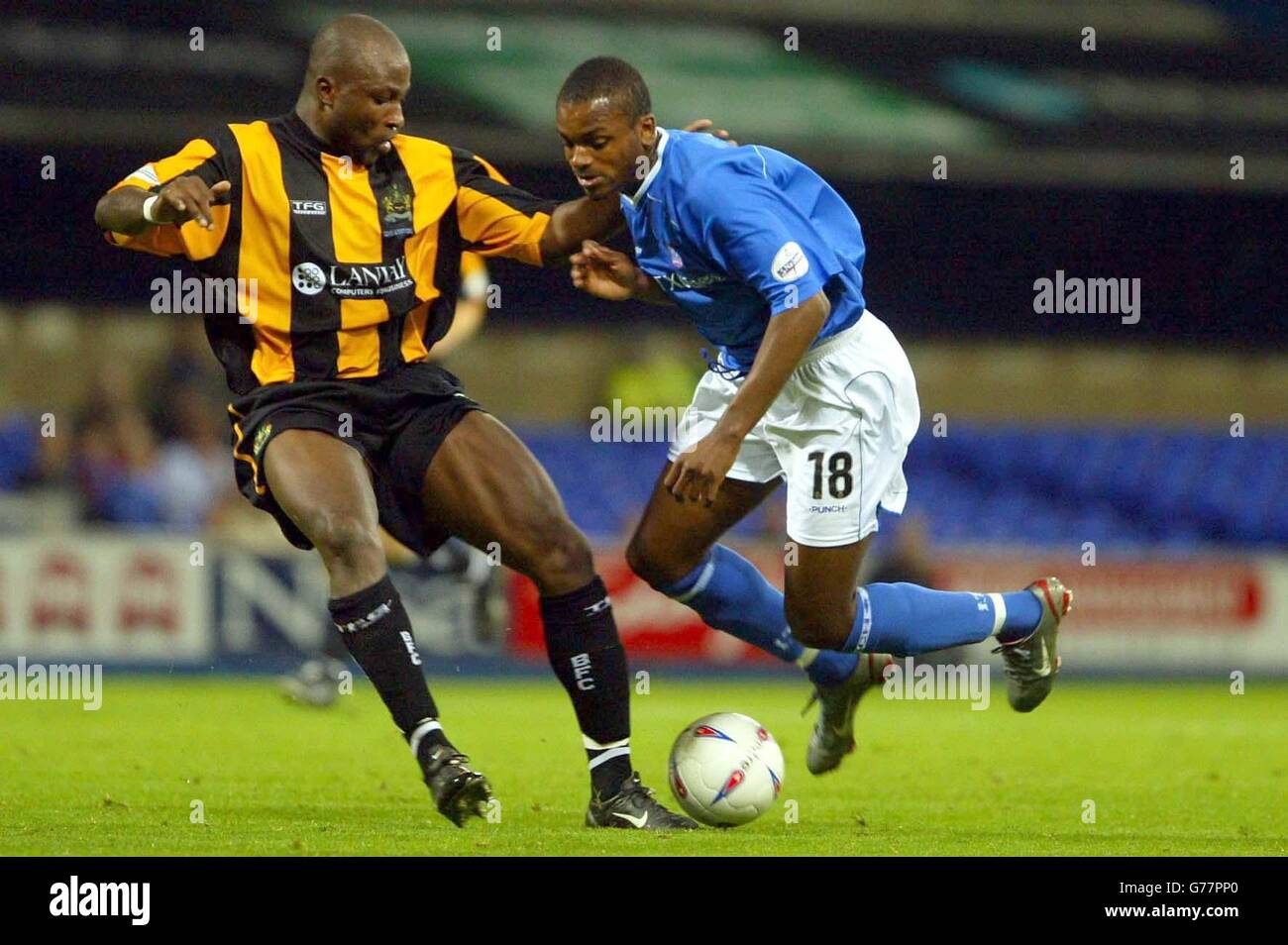 Ipswich darren bent right under pressure from burnleys arthur gnohere ...
