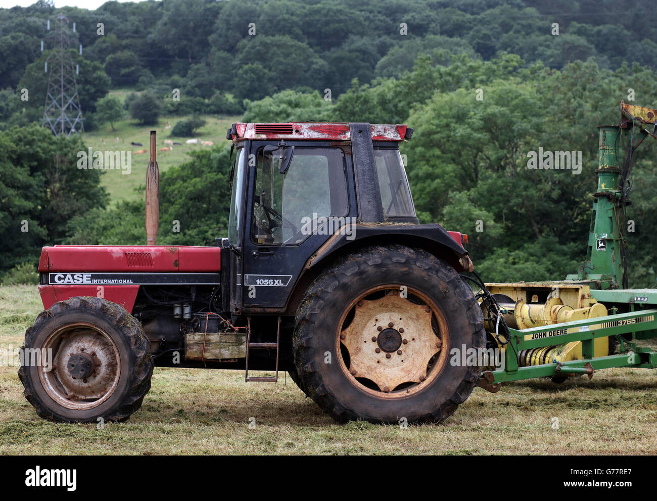 Case farm tractor and a John Deere machine near Sandford in Somerset ...