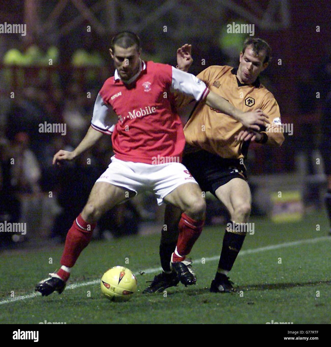Rotherham's Alan Lee Wards off Wolverhampton Wanderers' Kevin Cooper ...