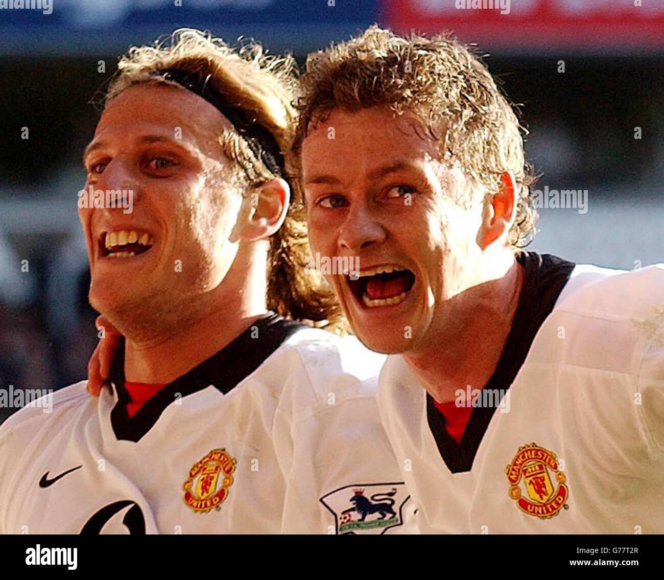 Diego Forlan (left) celebrates his second goal for Manchester United ...
