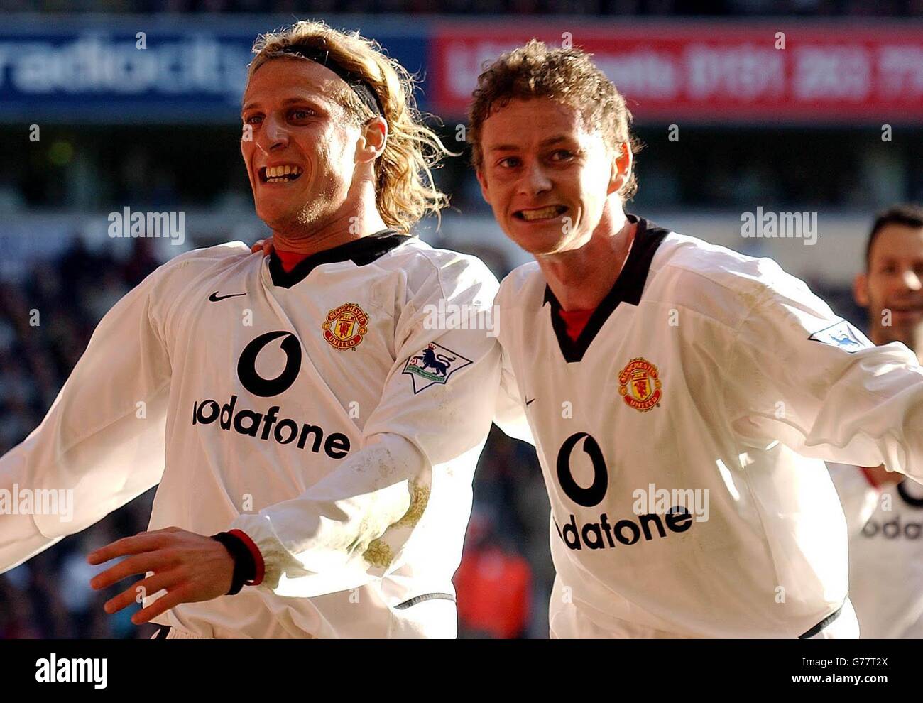 Diego Forlan (left) celebrates his second goal for Manchester United ...