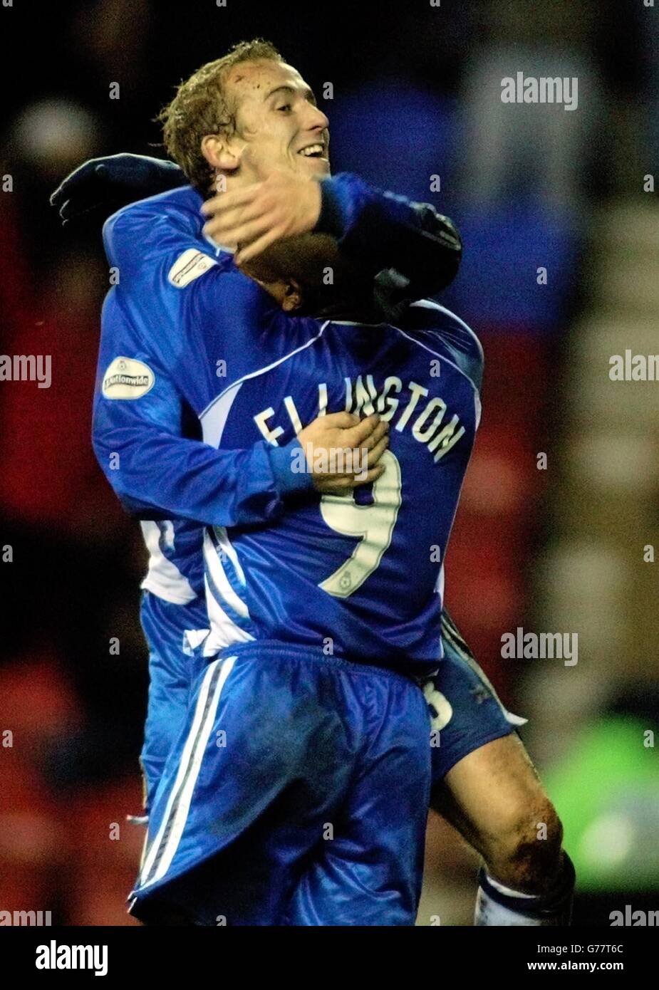 Wigan's Nathan Ellington celebrates his goal with teammate Andy Roberts ...