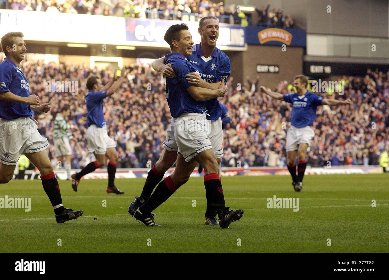 Michael Mols of Rangers (centre left) celebrates his goal against ...