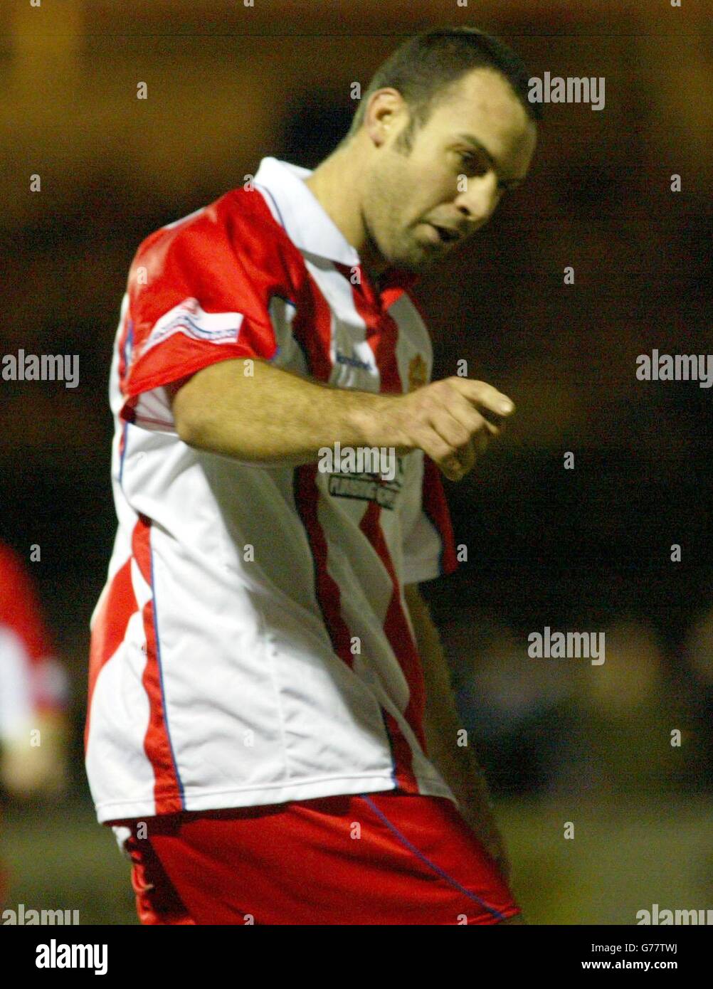 Dagenham's Danny Shipp leads the way after scoring the opening goal ...