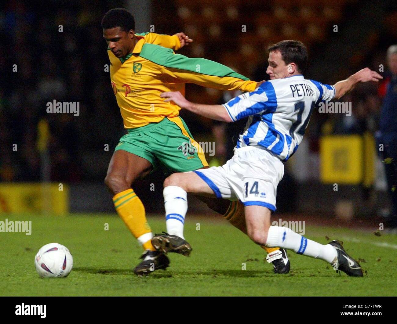 Brighton's Robbie Pethick tackles Norwich's Zema Abbey during their FA ...