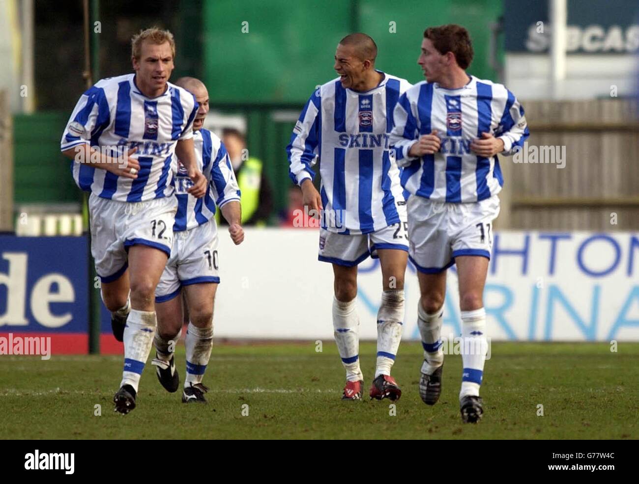 Brighton's Bobby Zamora (25) shares a joke with Charlie Oatway (10 ...