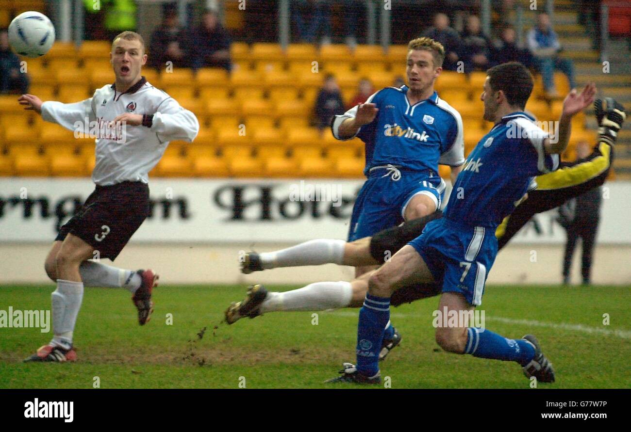 St Johnstone's Paddy Connolly (right) scores past Clyde defender Simon ...