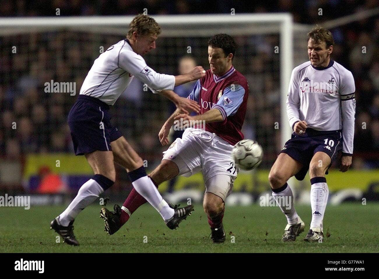 Ronnie Johnsen (centre) of Aston Villa challenges Tottenham's Steffen ...