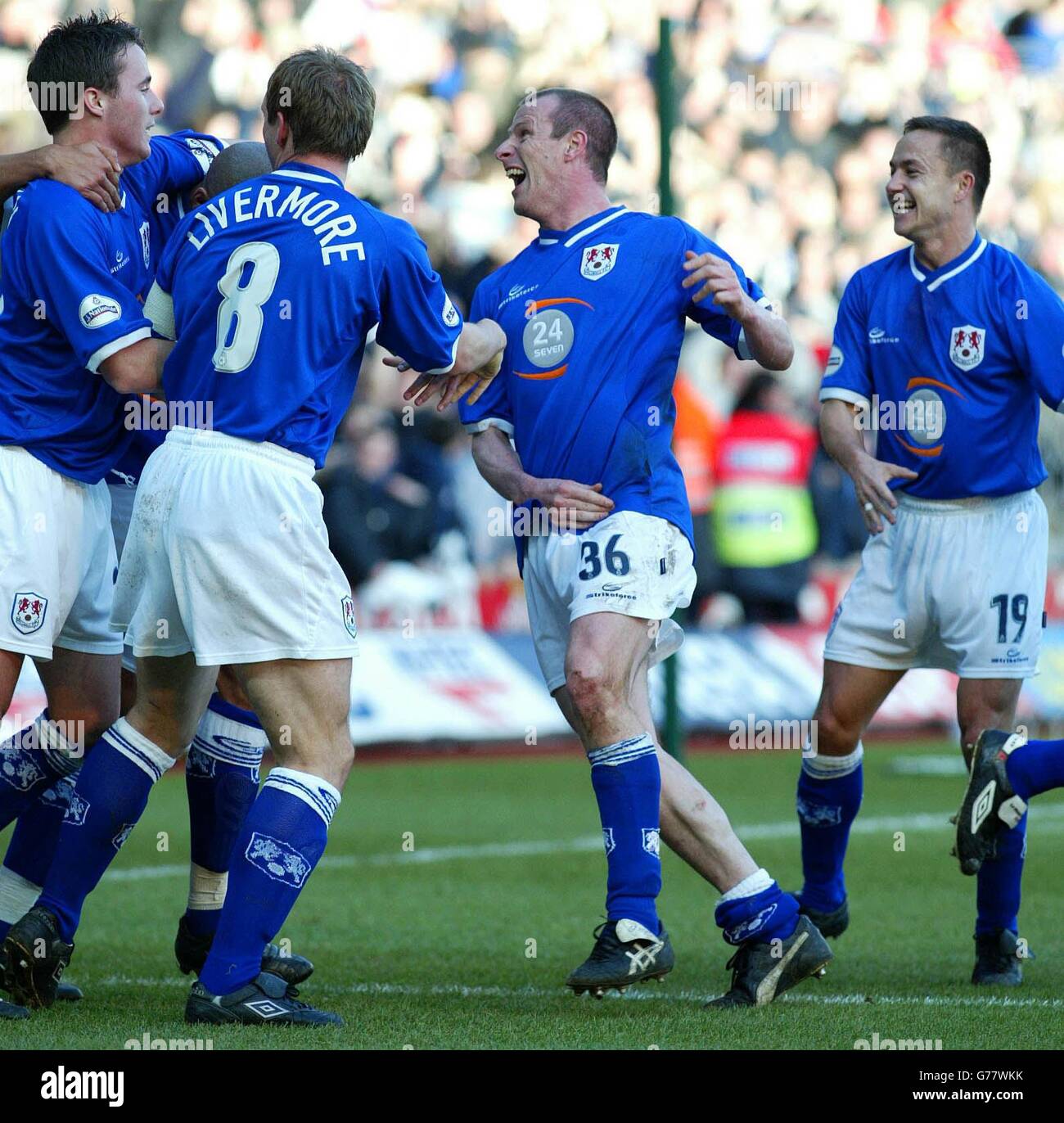 Millwall's goal scorer Steve Claridge (centre right) leads the ...