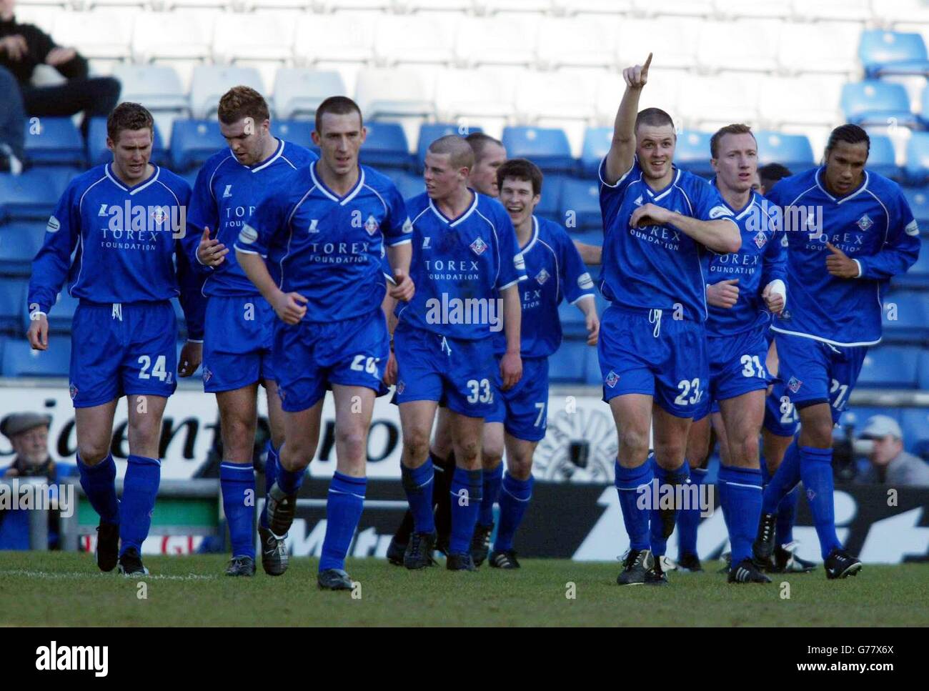 Oldham Athletic players celebrate Wayne Andrews (not pictured) first ...