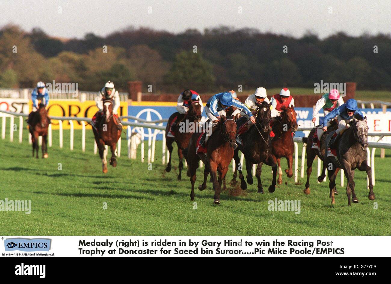 Horse Racing - The Racing Post Trophy at Doncaster. Medaaly (right) is ...