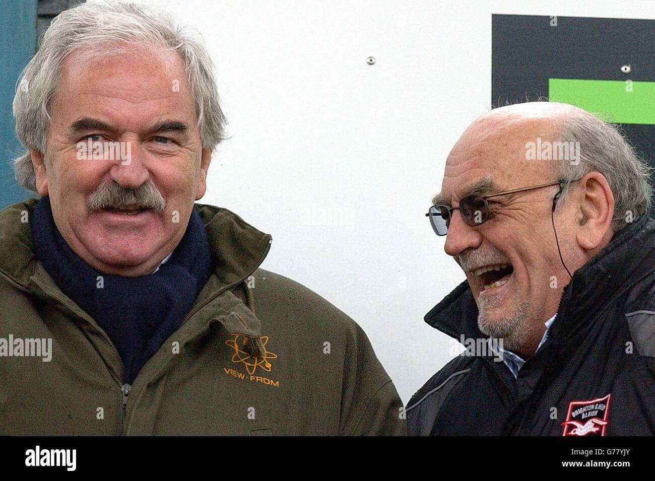 Brighton fan Des Lynam (L) jokes with Dick Knight, chairman of Brighton ...